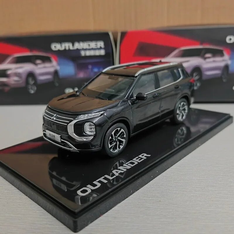 Модель автомобиля OUTLANDER 2023 1:43 металл