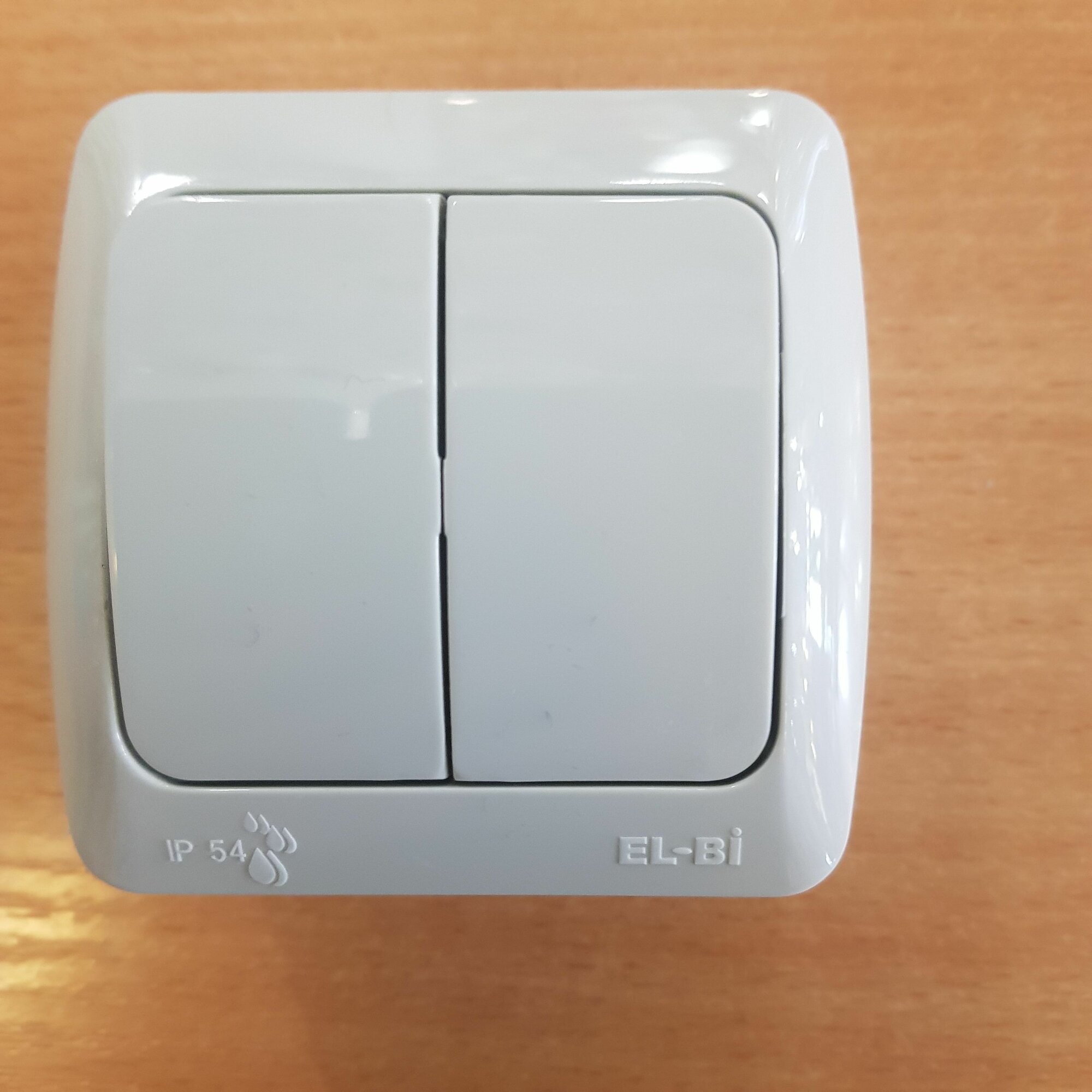 Выключатель "EL-BI"двухклавишный, накладной, с защитой IP 54 (защита от влаги), цвет серый