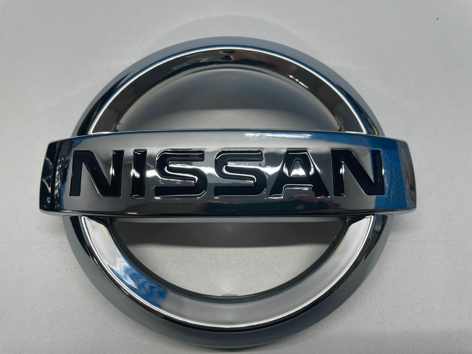 Эмблема Решетки Радиатора Nissan Qashqai J10