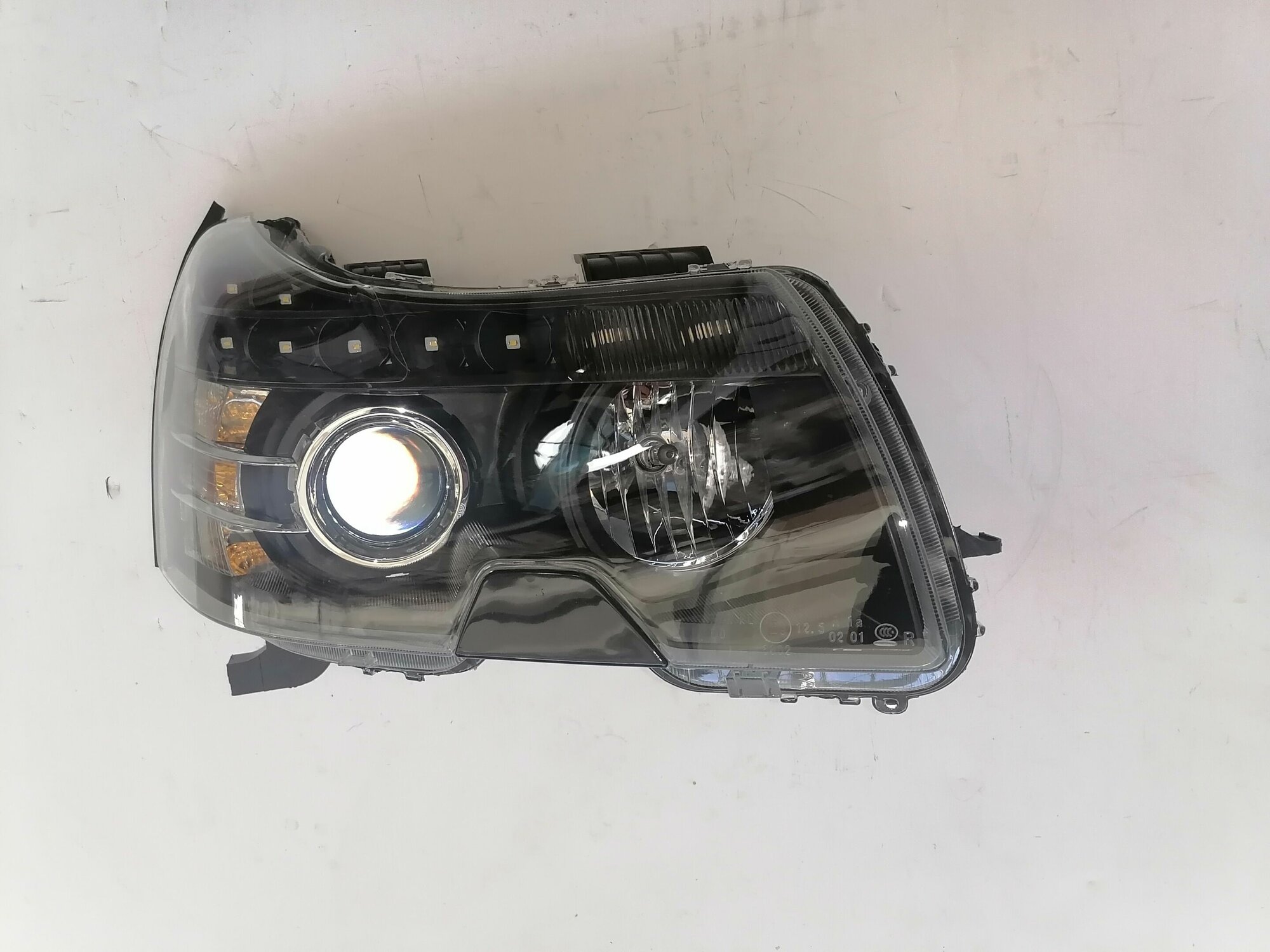 Фара правая Geely Emgrand EC8 [2.4 16V 6AT седан] 1017021258