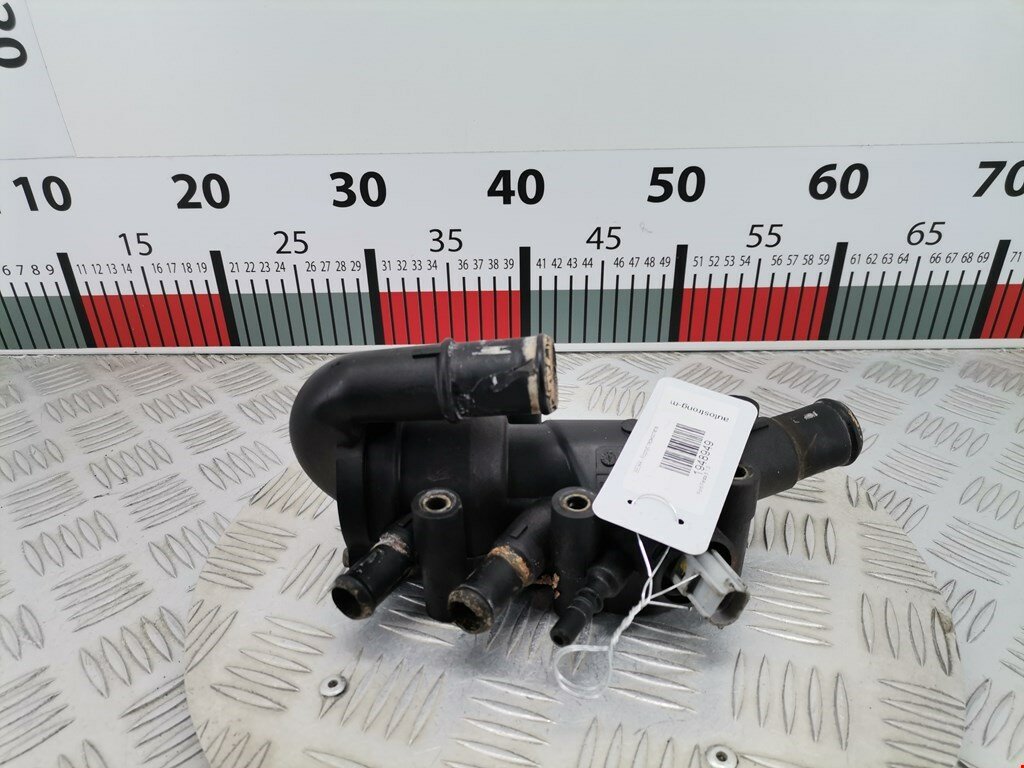 Корпус термостата Ford Fiesta 5 2S6G9K478A2B арт. 1948949