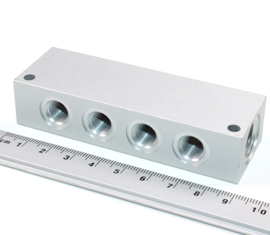 3053 1/4-4L-1/8, коллектор 4 выхода односторонний