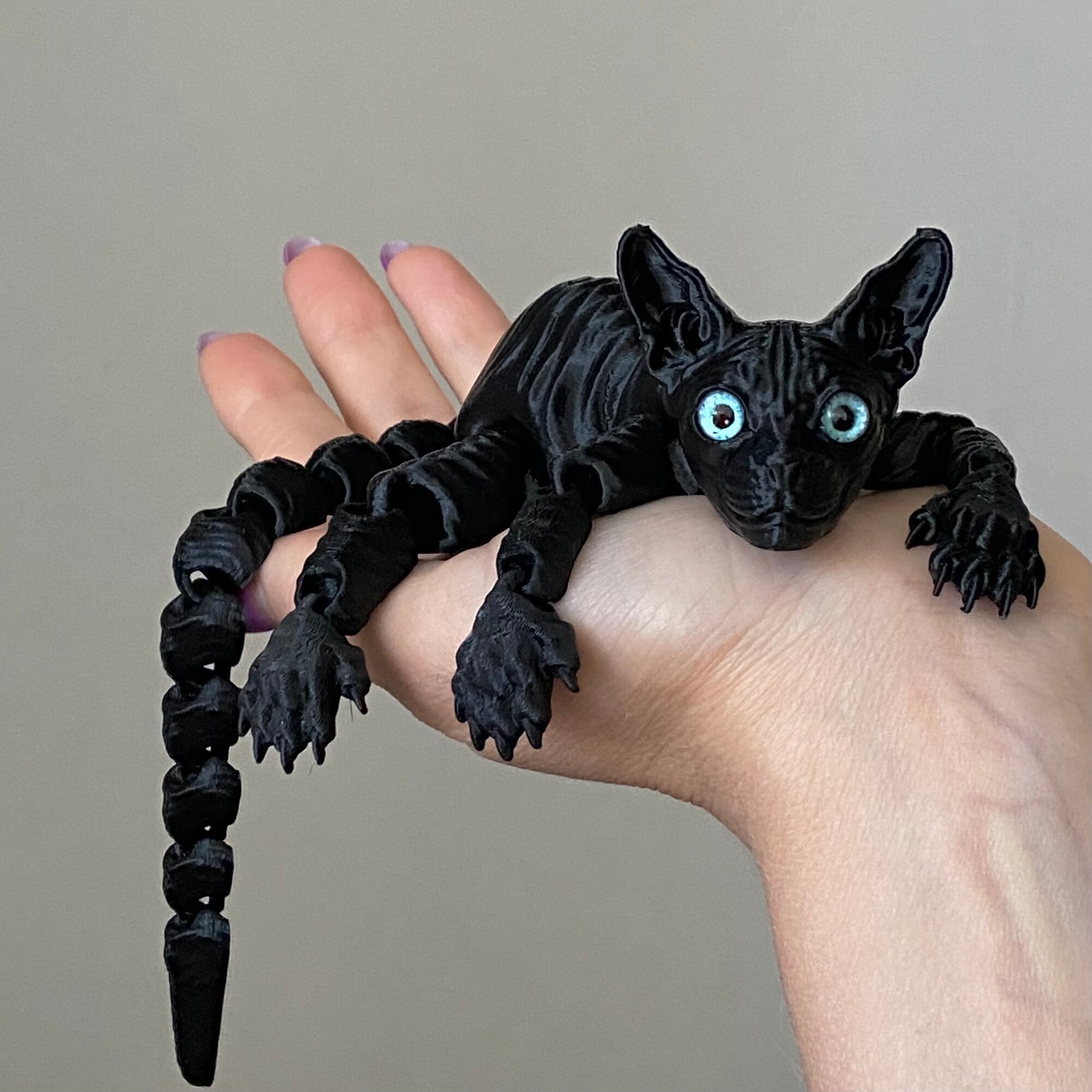 Игрушка антистресс Кот сфинкс подвижный, пластик, черный, 22,5см, голубые стеклянные глаза