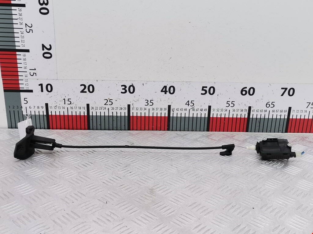 Сервопривод (электропривод моторчик привода) лючка бензобака Opel Astra H 13208157 арт. 1887007