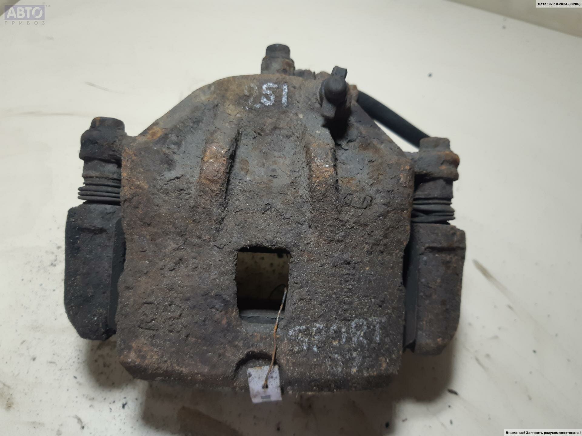 Суппорт передний левый Kia Sportage (2004-2010)