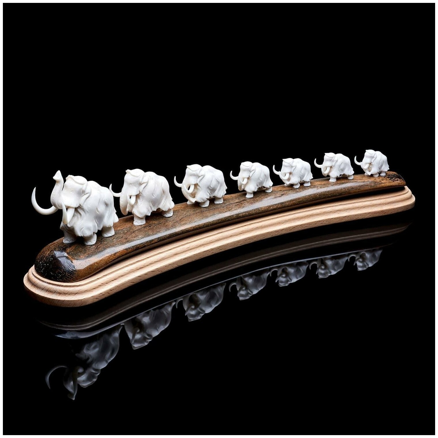 Скульптура из кости "Кочующее стадо мамонтов" на деревянной подставке