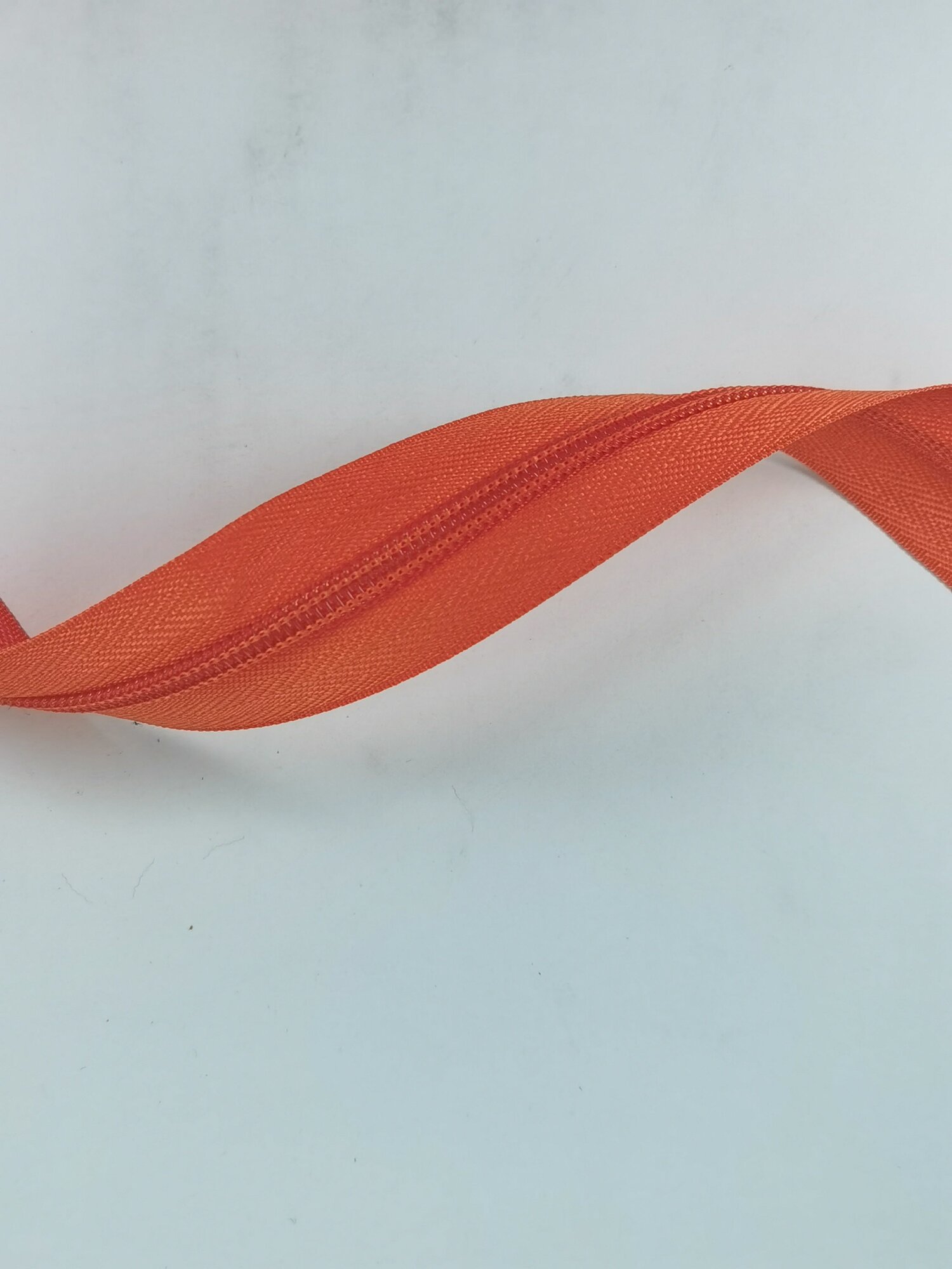 Молния рулонная тип 5, 50 метров, оранжевый 157/ витая (спиральная)