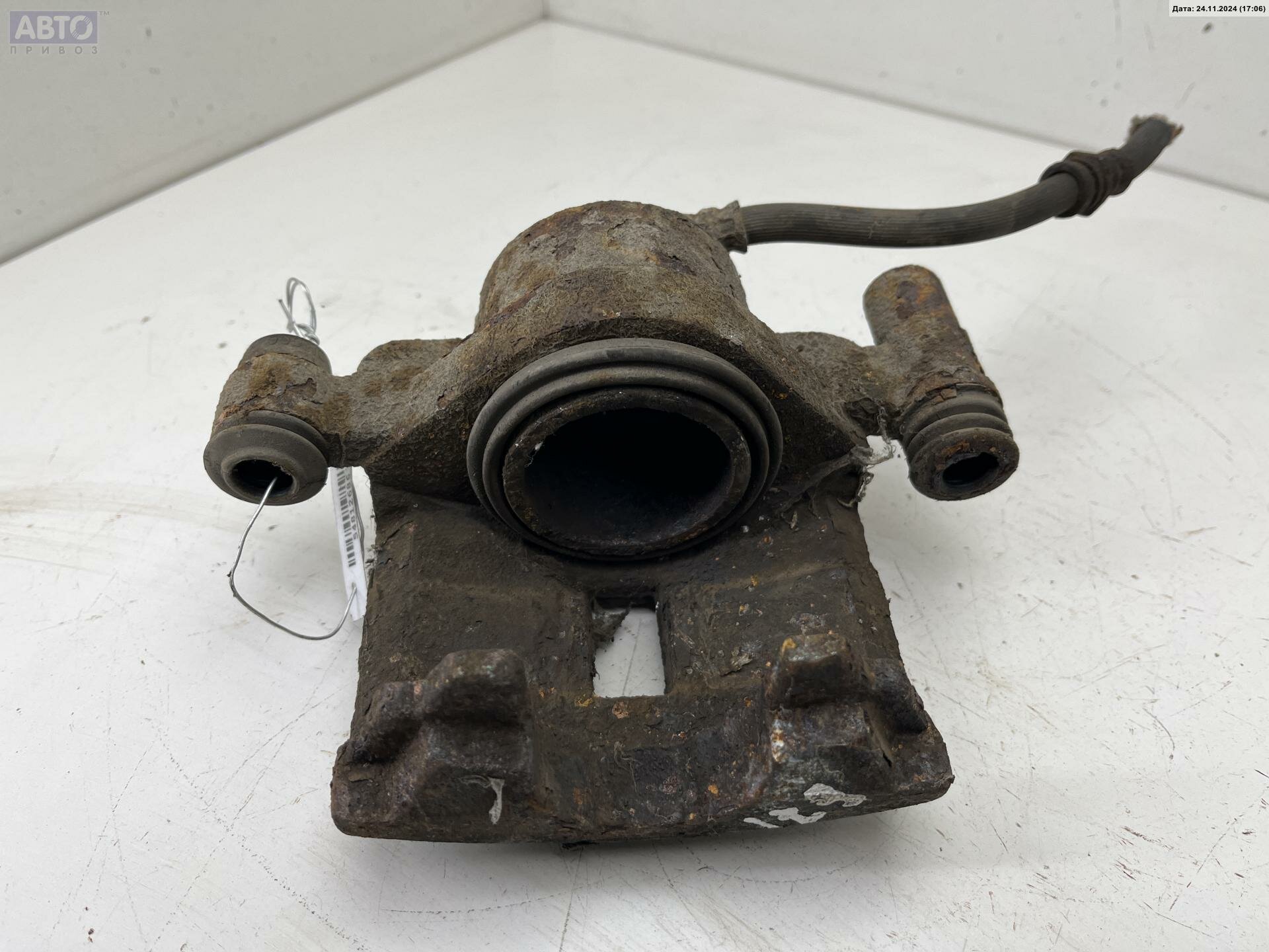 Суппорт передний правый Mazda Premacy