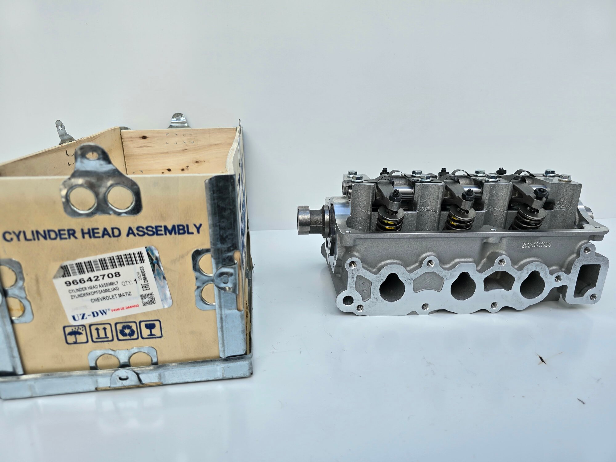 Головка блока цилиндров в сборе (под катушку - модуль) с двумя ocью коромыceл Матиз 0.8