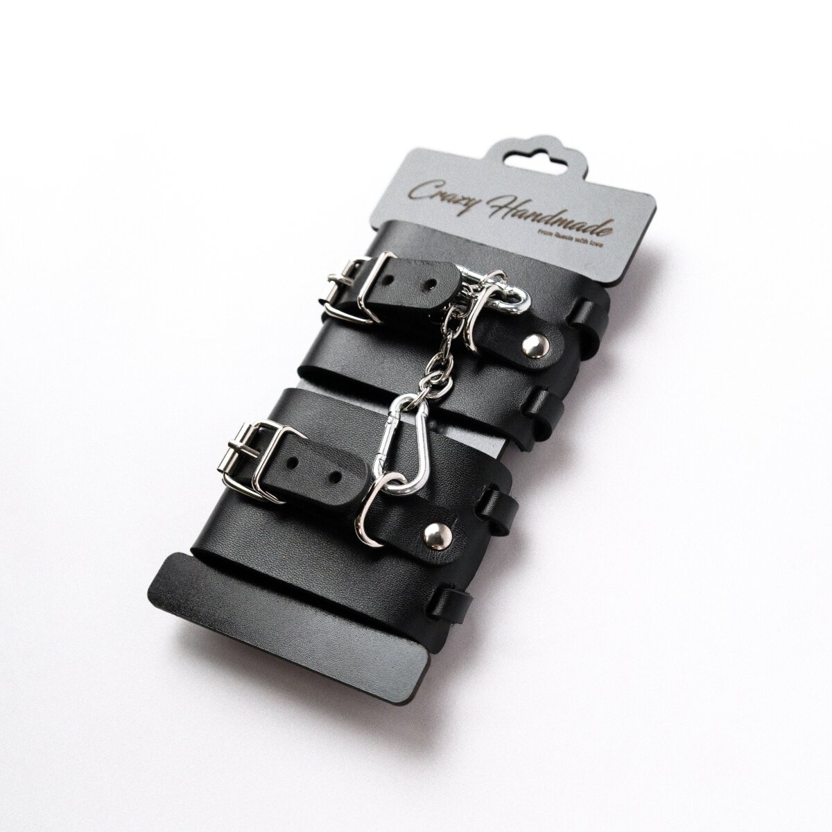 Наручники из черной кожи с креплением в виде веревочек