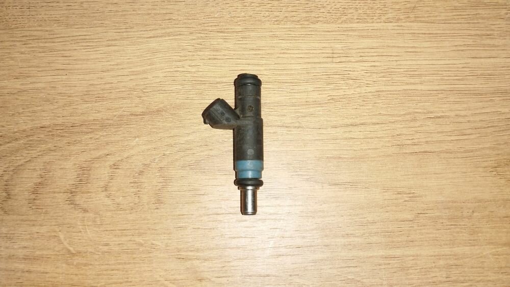 Форсунка топливная 06B133551K 2.0 ALT 06B133551K