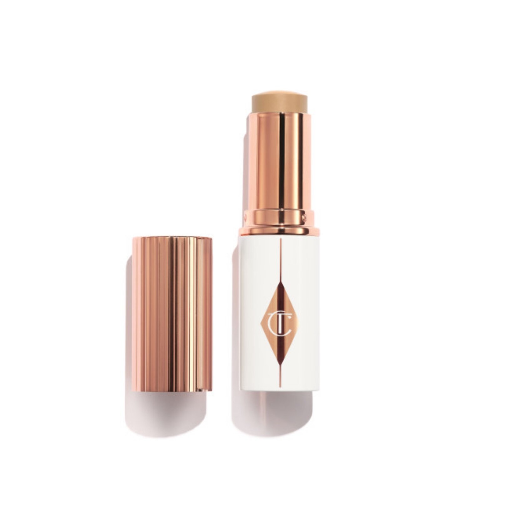 Charlotte Tilbury Тональный крем в стике Unreal Skin Sheer Glow Tint,5 Medium 9г