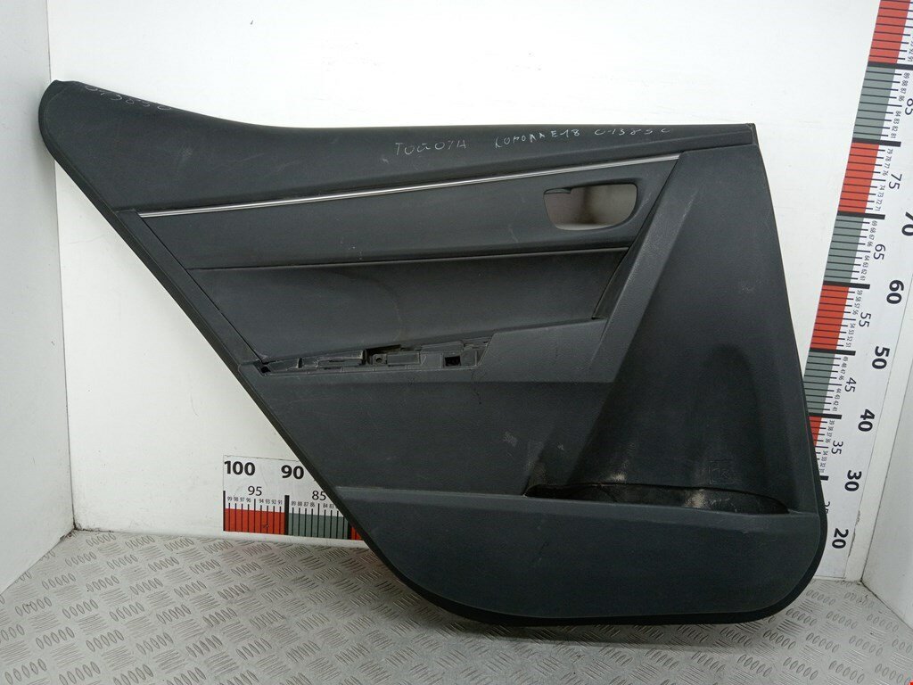Обшивка (карта) двери задней левой Toyota Corolla 11 арт. 2255013