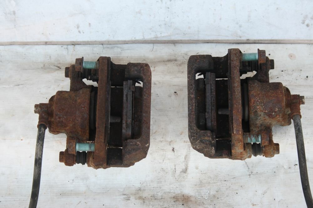 Суппорт тормозной задний правый Mazda CX7 L206-26-980D