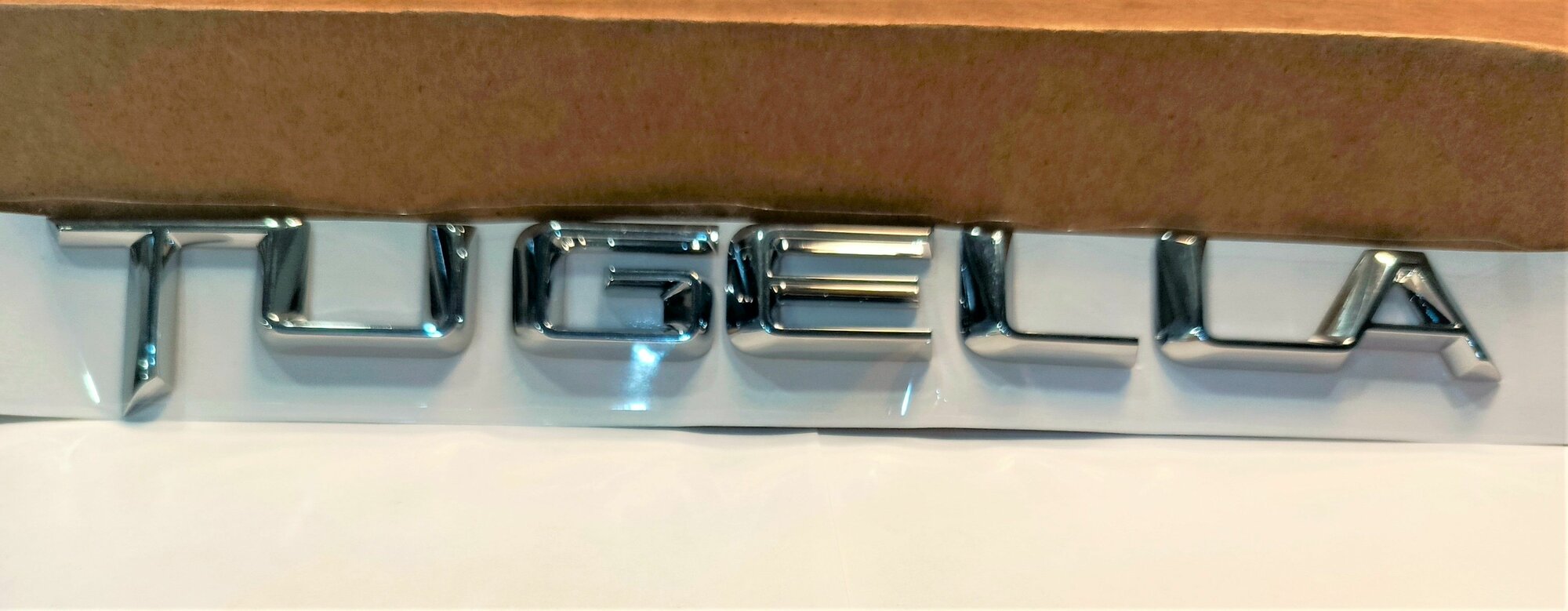 Оригинал Эмблема, шильдик, логотип. Надпись "Tugella" на багажник автомобиля Geely Tugella