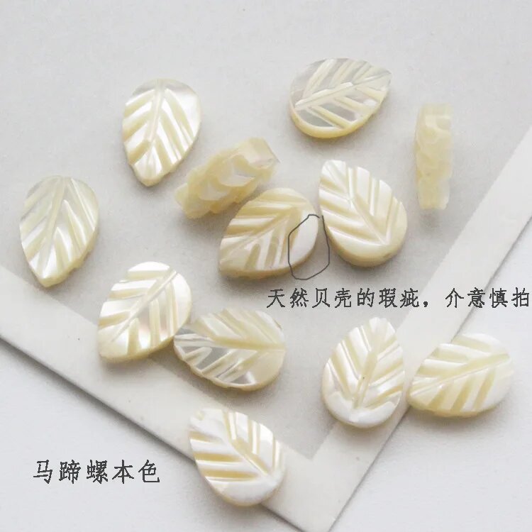 Бусины из раковин черных/белых цветов 6x9mm C