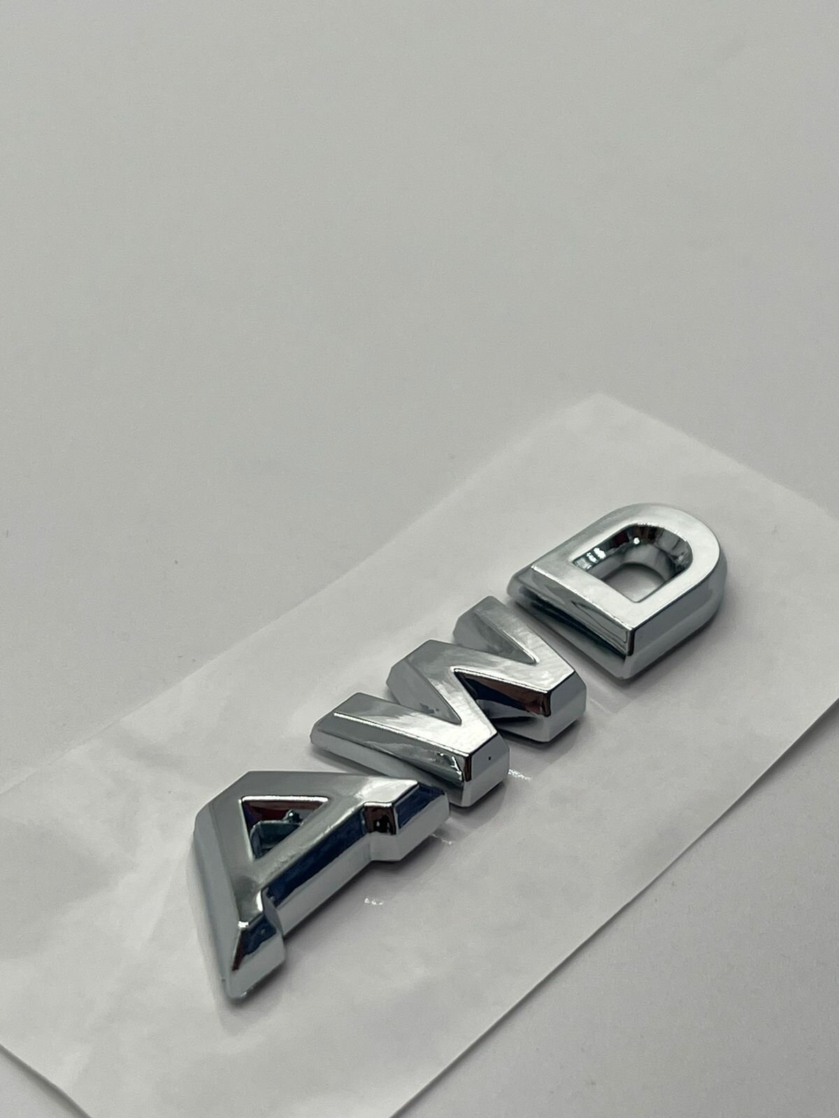 Шильдик надпись наклейка AWD металл 6см