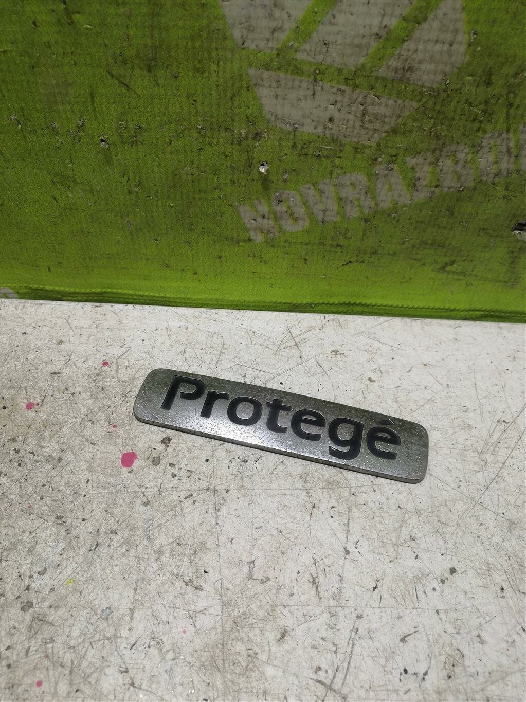 Эмблема Mazda 323 BJ Protege Familia 1998-2002