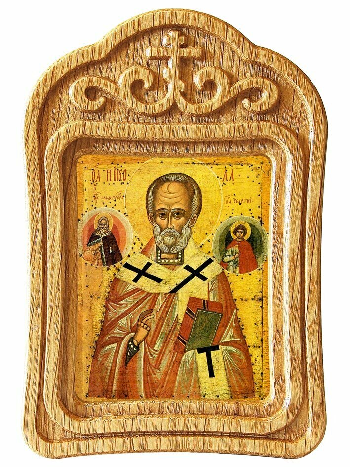 Николай Чудотворец с Илией Пророком и Георгием Победоносцем, XV - XVI вв, икона в резной деревянной рамке