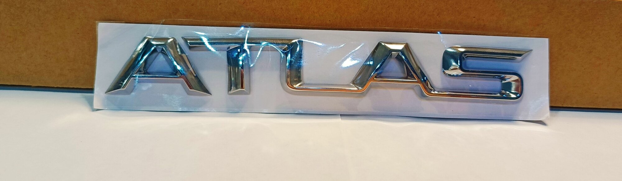 Эмблема, шильдик, логотип. Надпись "Atlas" на багажник автомобиля Geely Atlas Эмблема для автомобиля