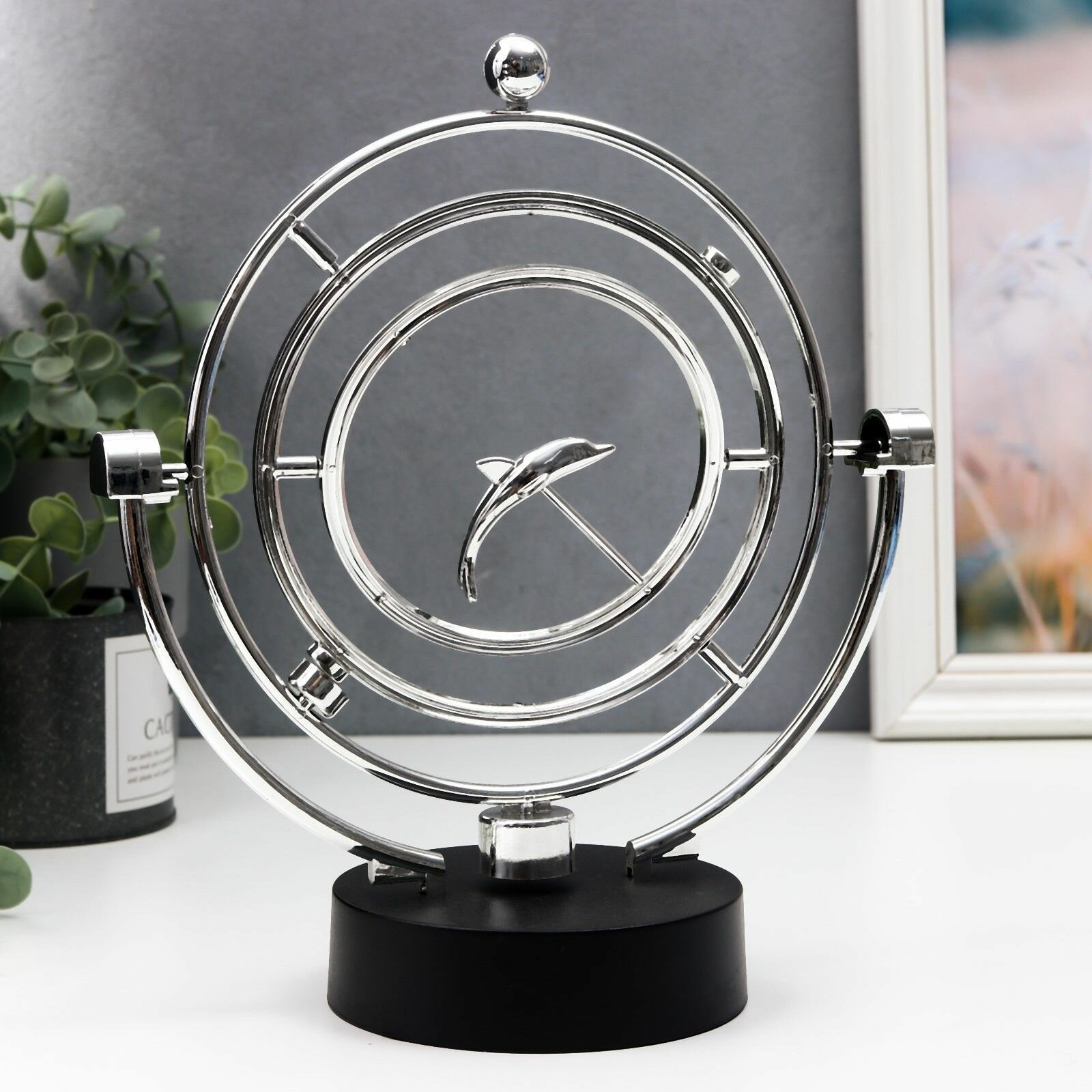 Маятник "Дельфины и кольца"