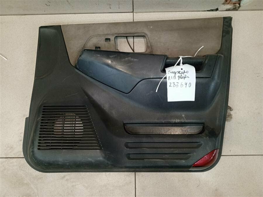 Обшивка двери передней правой от Mitsubishi Pajero iO 1998-2007