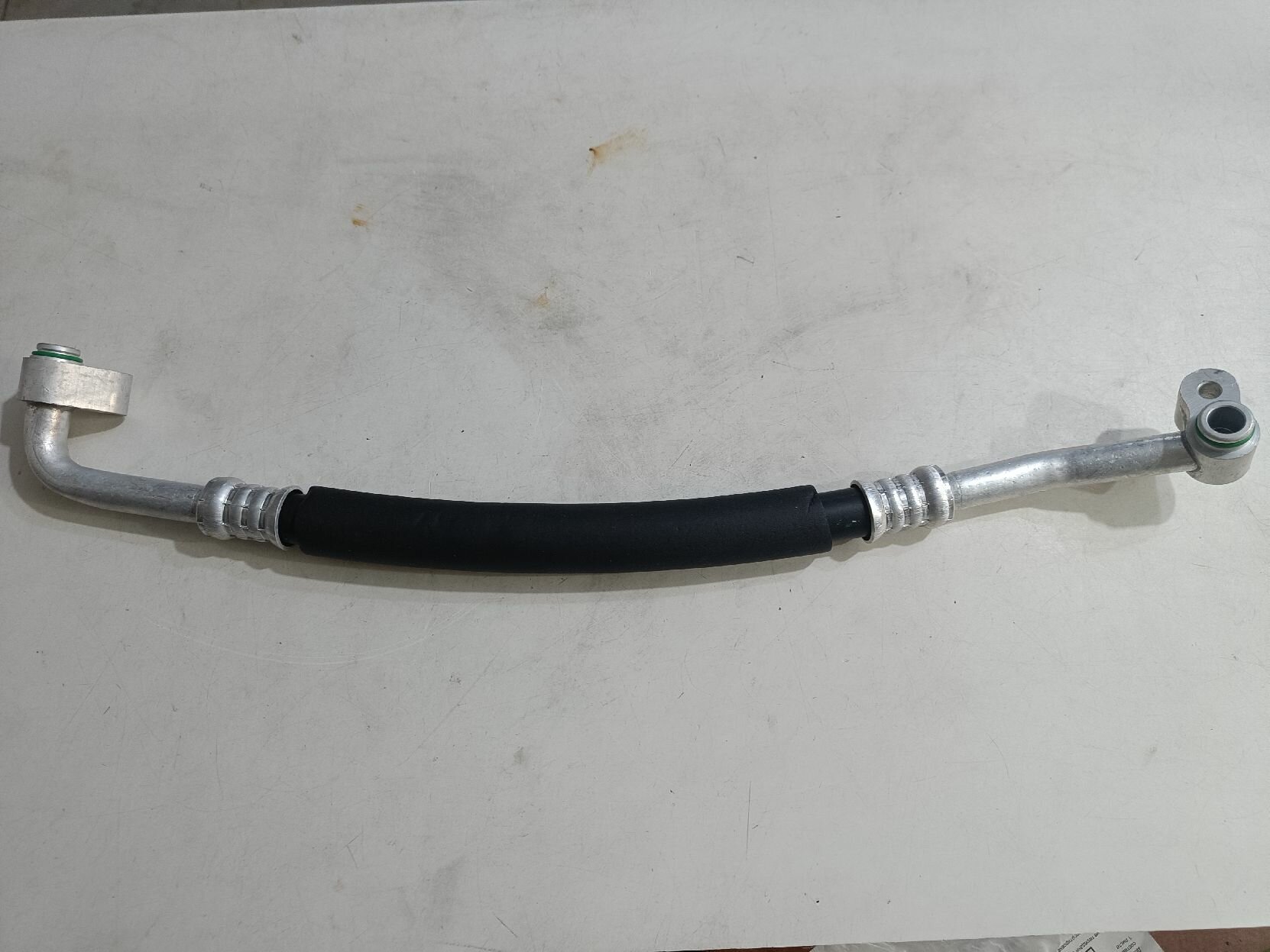 Трубка кондиционера Geely MK рестайлинг (2009+) [1.5 16V 5MT седан] 1018002700