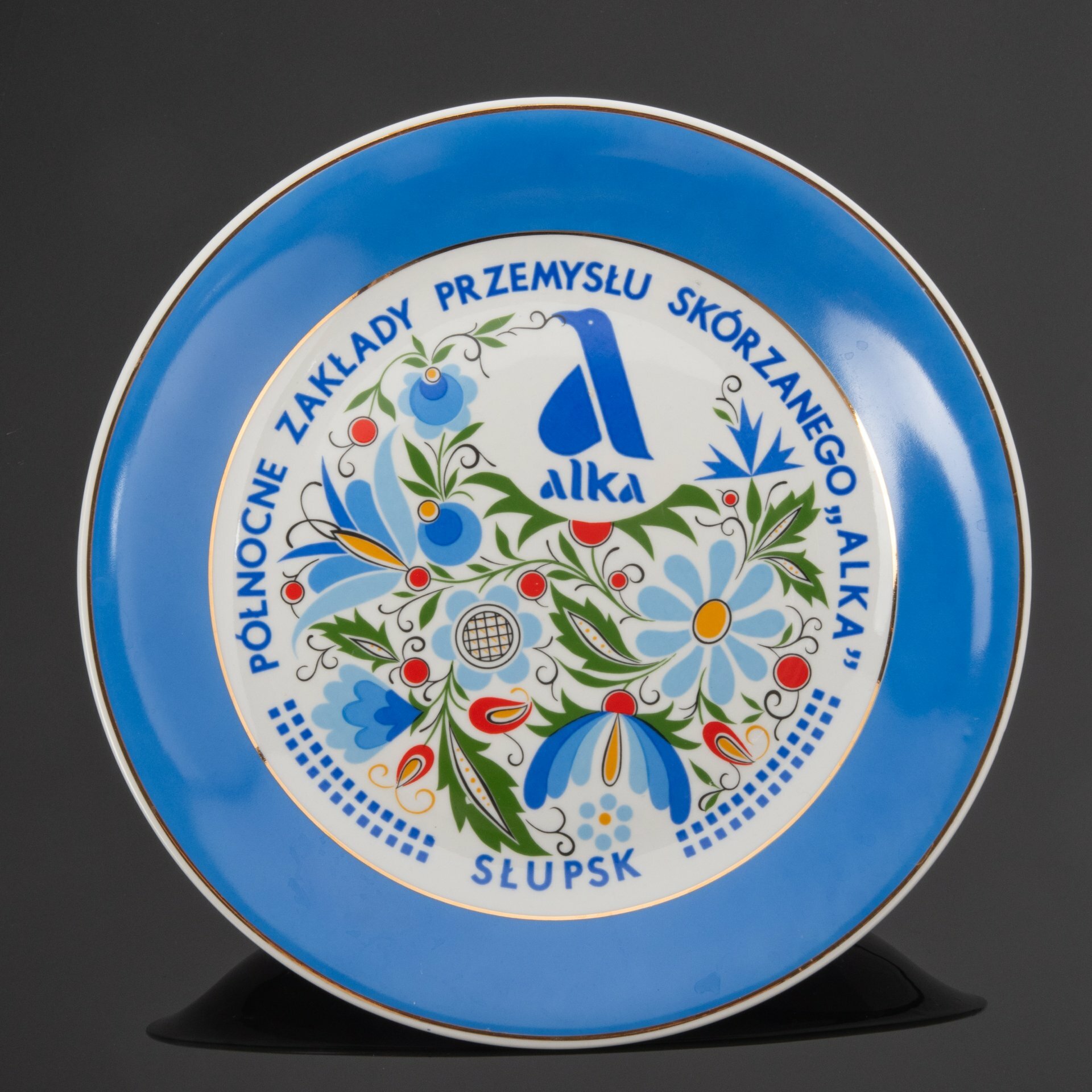 Настенная тарелка "Północne Zakłady Przemysłu Skórzanego „Alka” Słupsku" (Северный кожевенный завод «Алка» в Слупске)