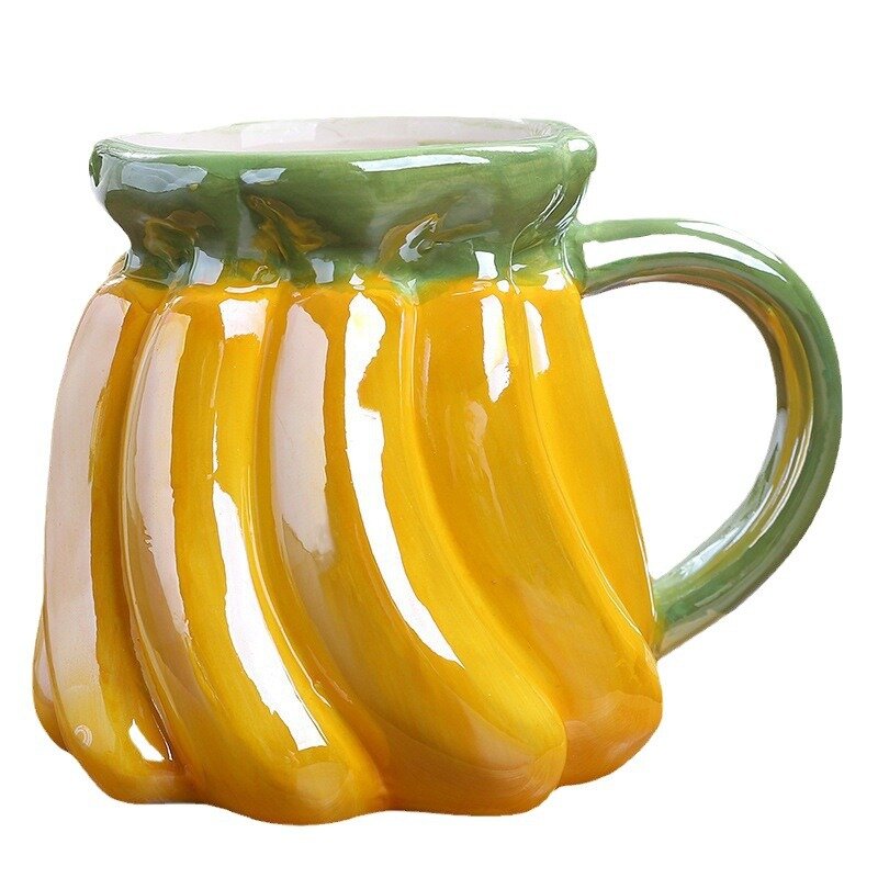 Керамическая кружка в форме банана — весёлый и красочный дизайн, объём 350 мл, идеально подходит для кофе, чая и подарков.