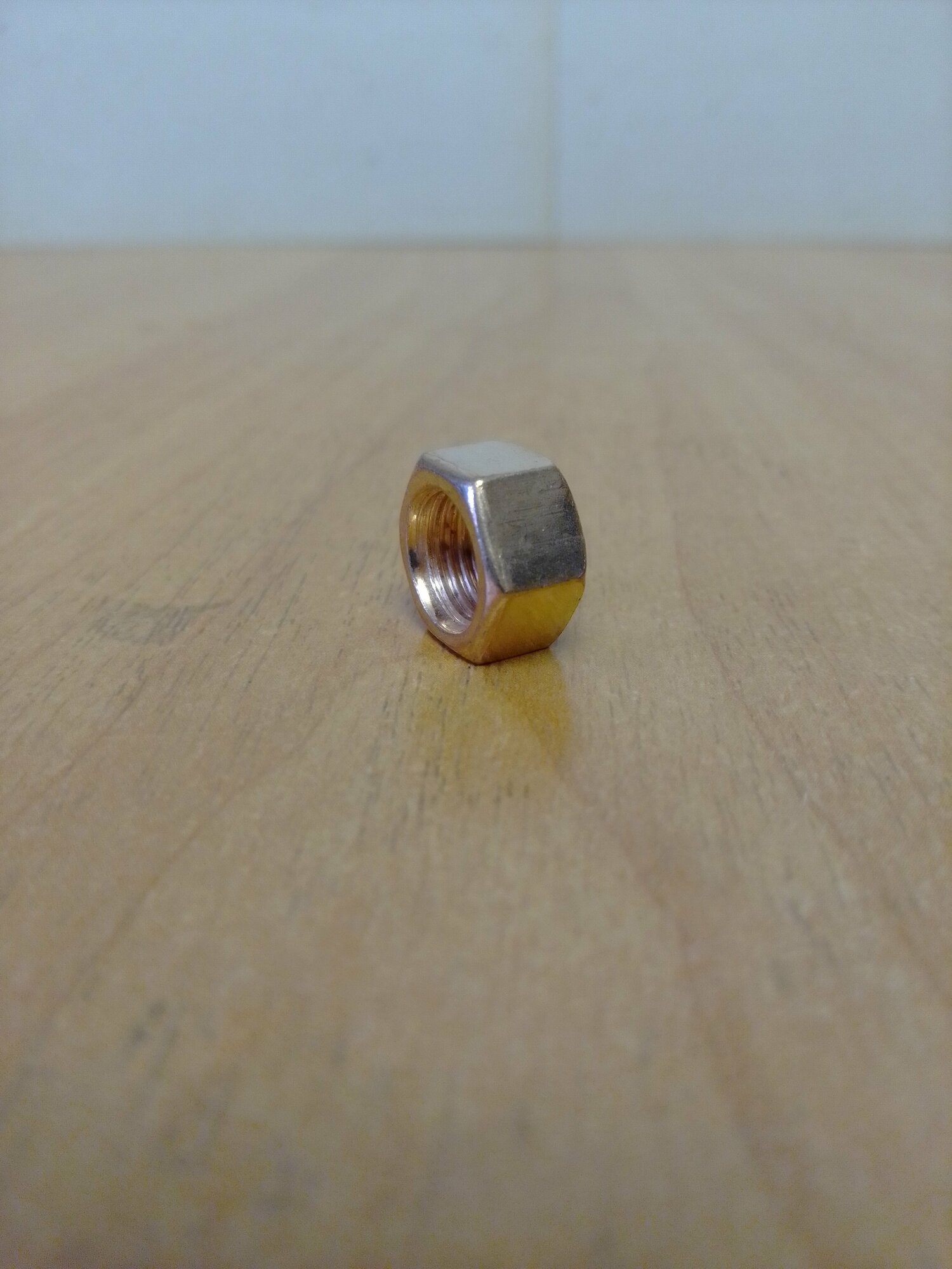 Гайка коллектора, приёмной трубы М10х1 омедненная. Россия, Красная Этна. Ключ 14 мм.