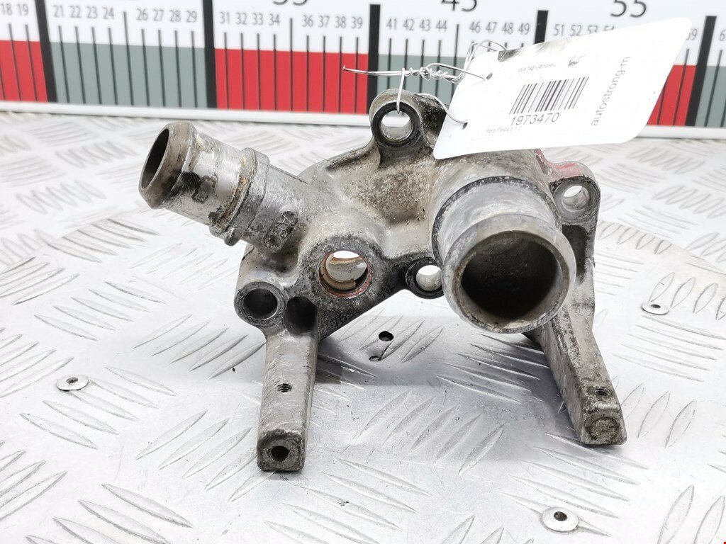 Фланец (штуцер системы охлаждения тройник) Ford Fiesta 5 1N1G8594 арт. 1973470