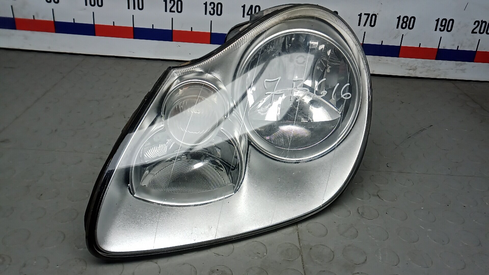 Фара левая PORSCHE CAYENNE 1