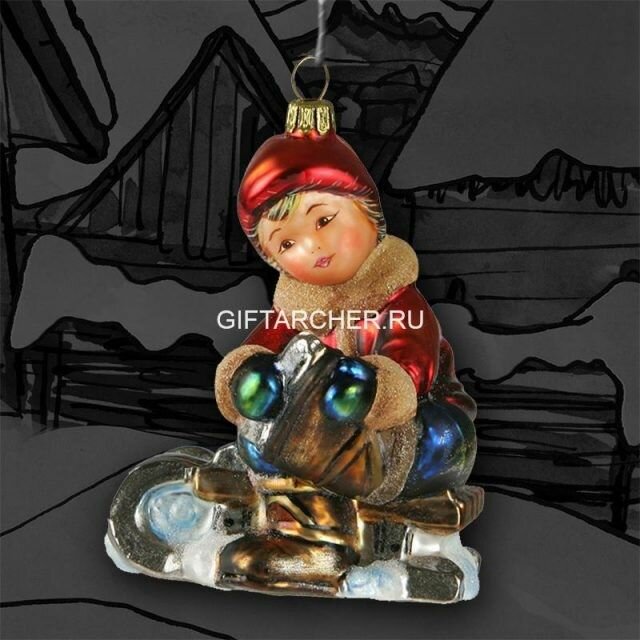 Игрушка на елку Мальчик надевающий коньки