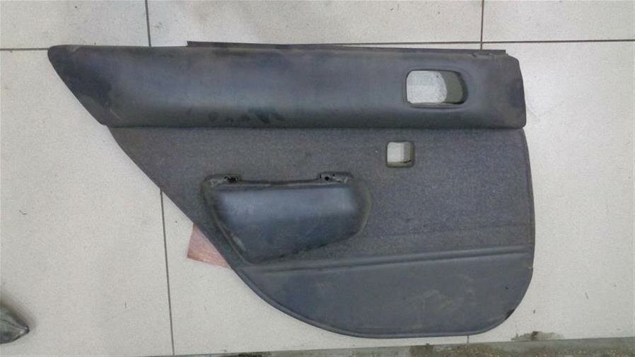 Обшивка двери задней левой от Toyota Corolla E110 1995-2002