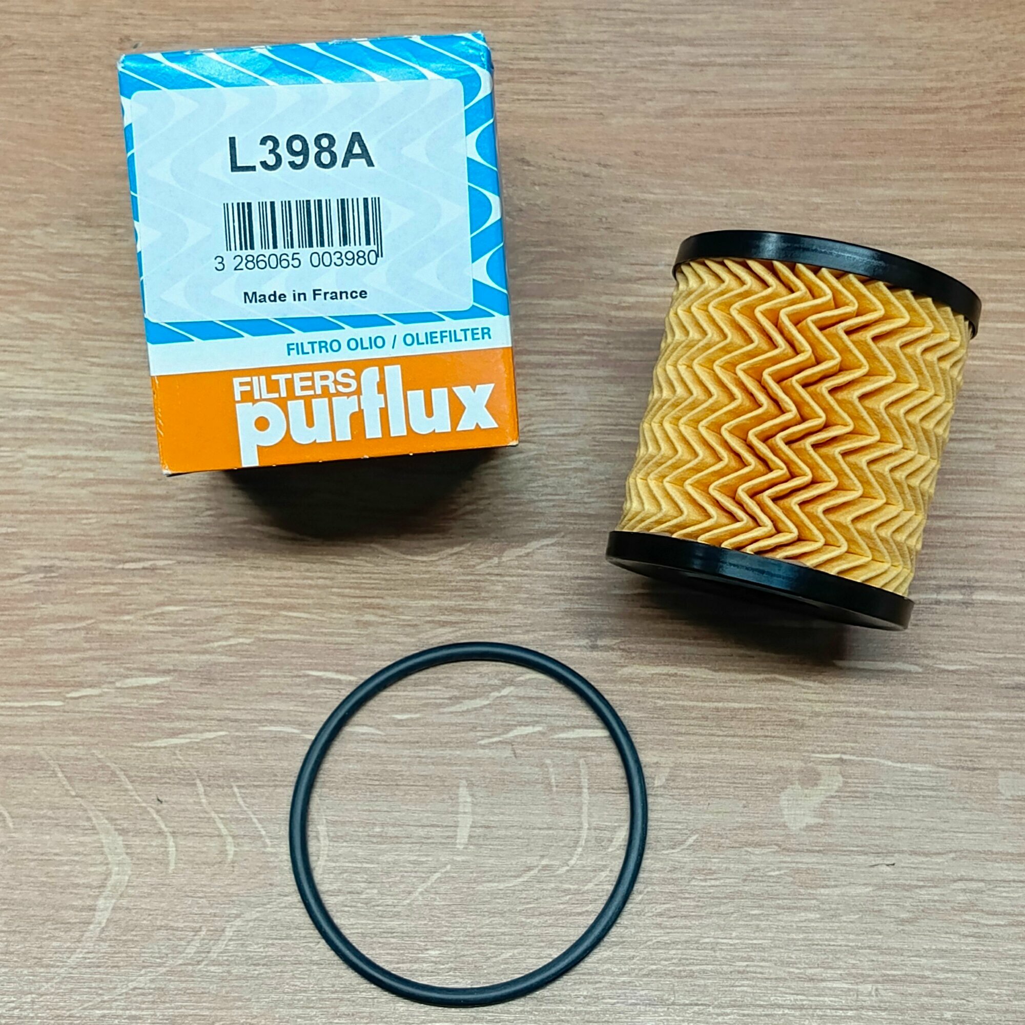 Фильтр масляный Peugeot Citroen арт. L398A