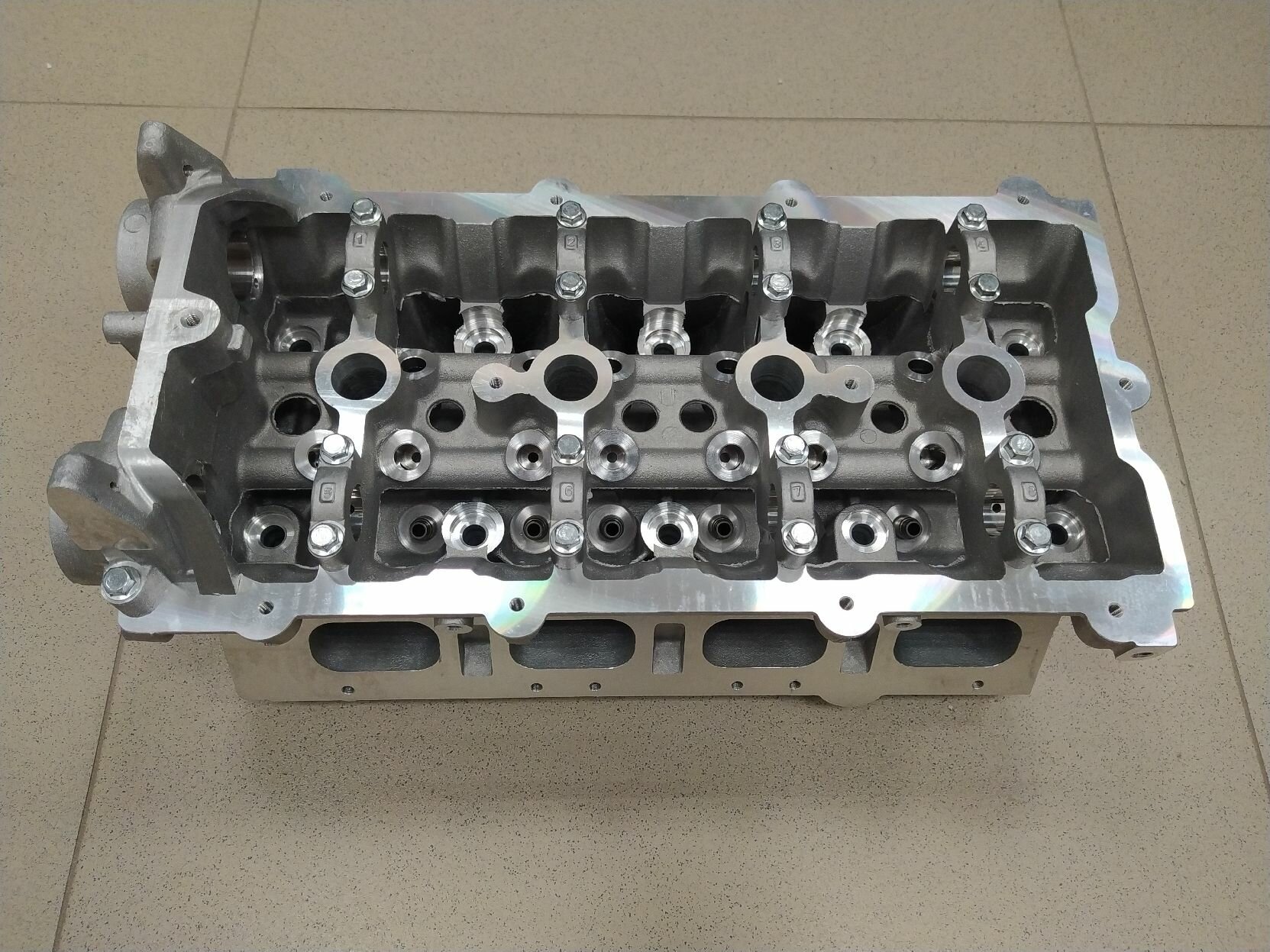 Головка блока цилиндров голая Chery Tiggo [2.0 16V 5MT внедорожник 4X4] 481FB1003015MA