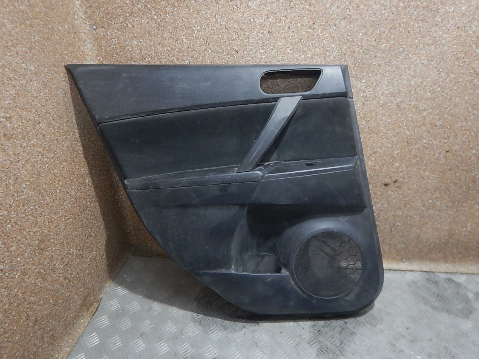 Б/У Обшивка двери задней левой, Mazda (Мазда)-3 (BL) (09-13) MAZDA 3 (BL) (09-13) седан Царапины. 484676 MAZDA арт. BBW16...