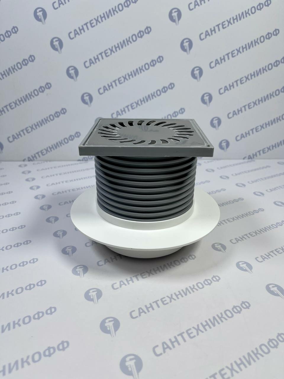 Трап вертикальный регулируемый MIANO 50мм, нержавеющая решетка 100х100мм. (PV50N-L2)