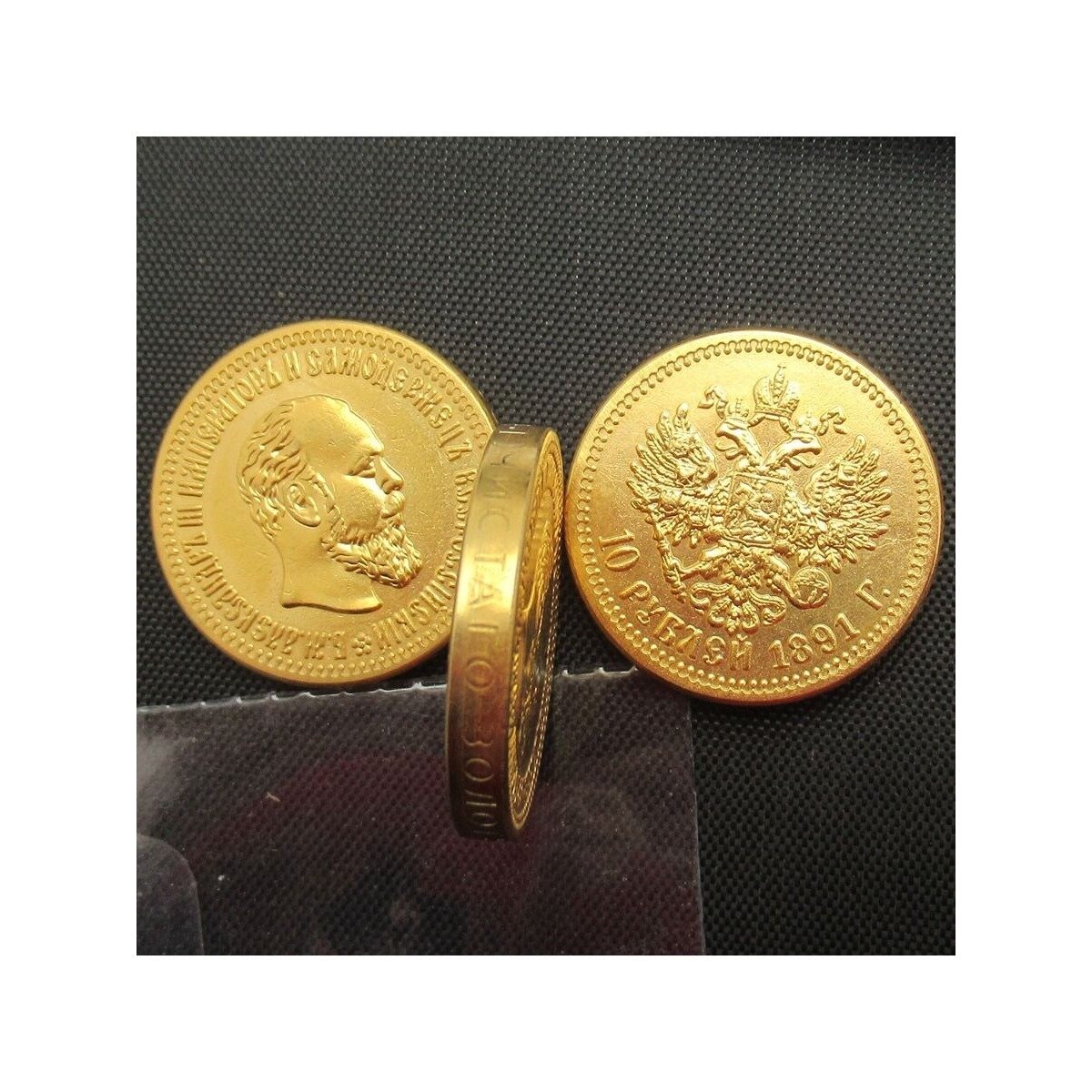 Позолоченные памятные монеты номиналом 10 рублей (1886-1894 гг.) в 9 моделях.