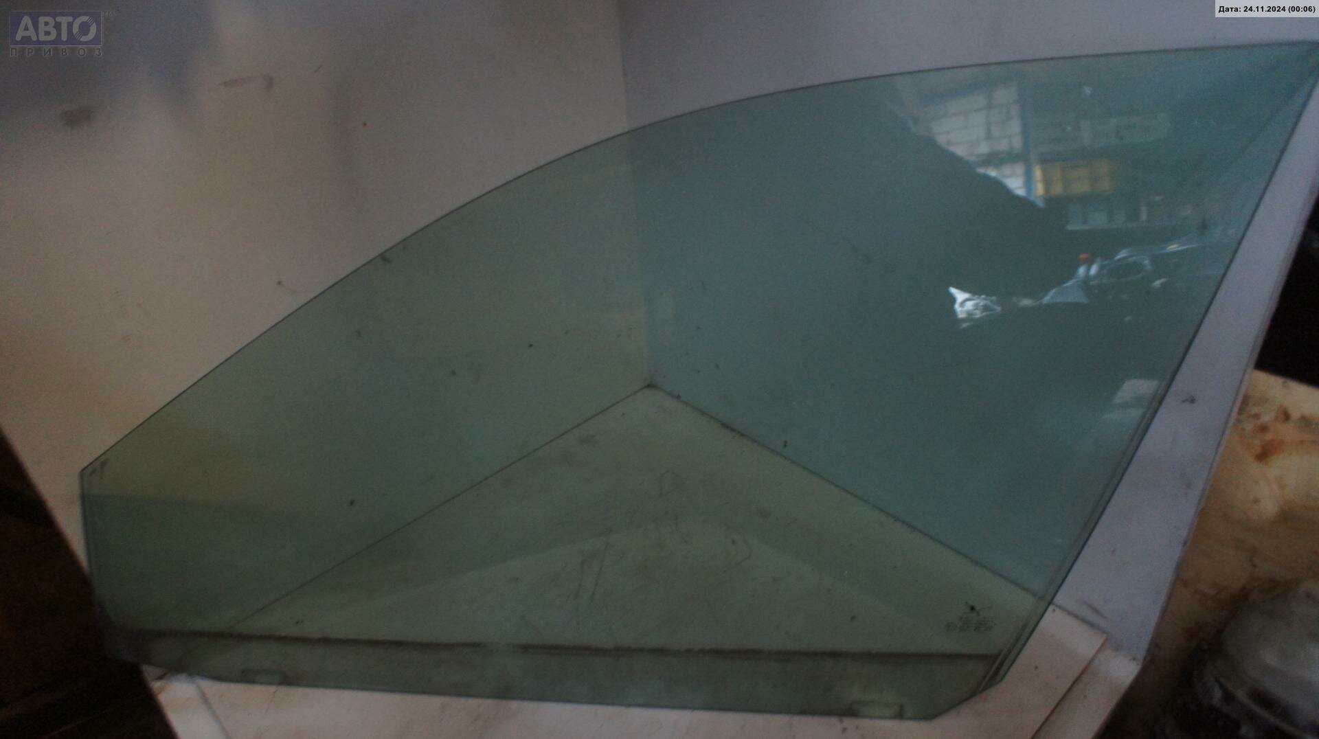 Стекло двери передней левой Saab 9-3 (2002-2007)