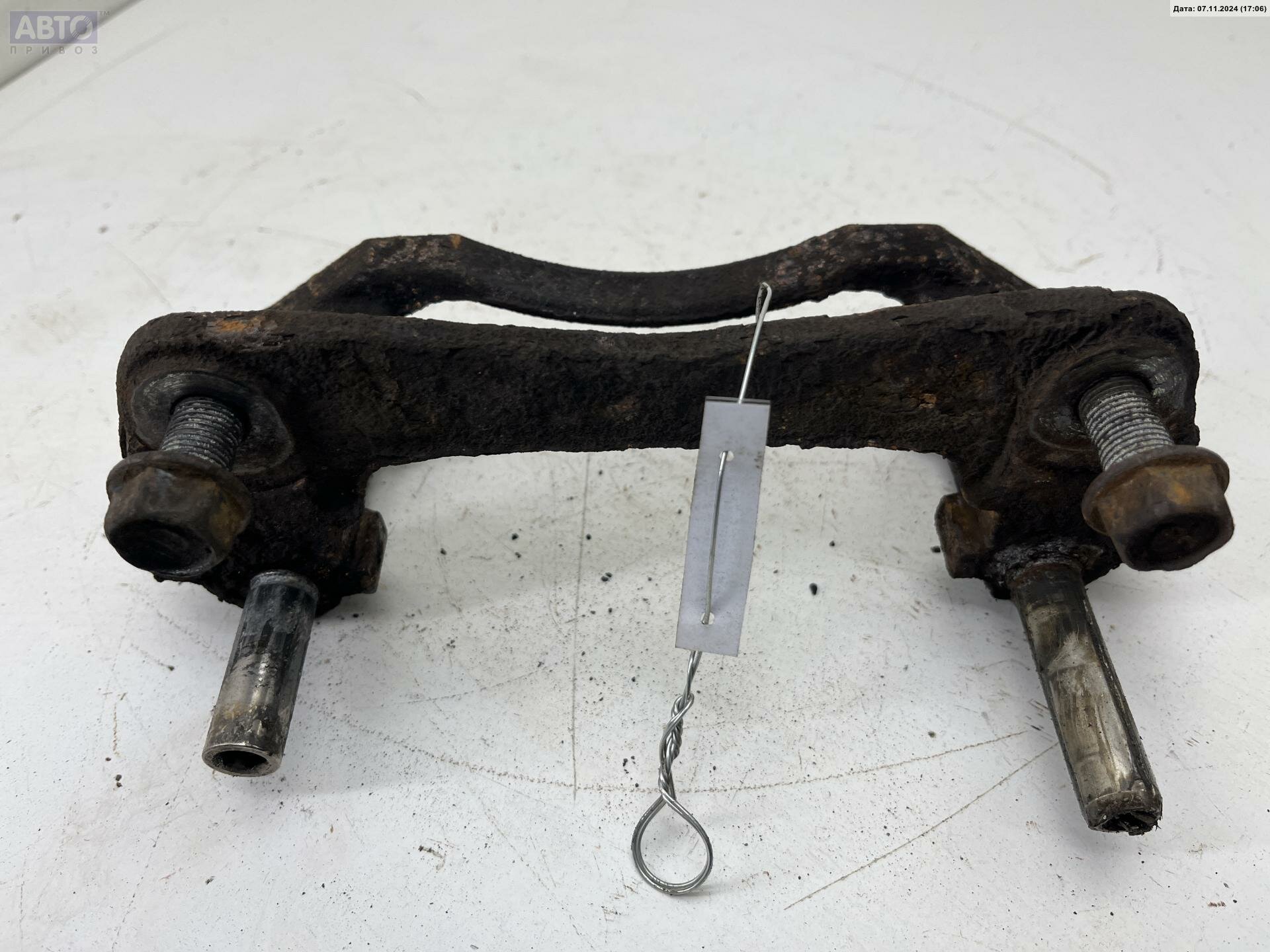 Скоба суппорта переднего Mazda 6 (2002-2007) GG/GY