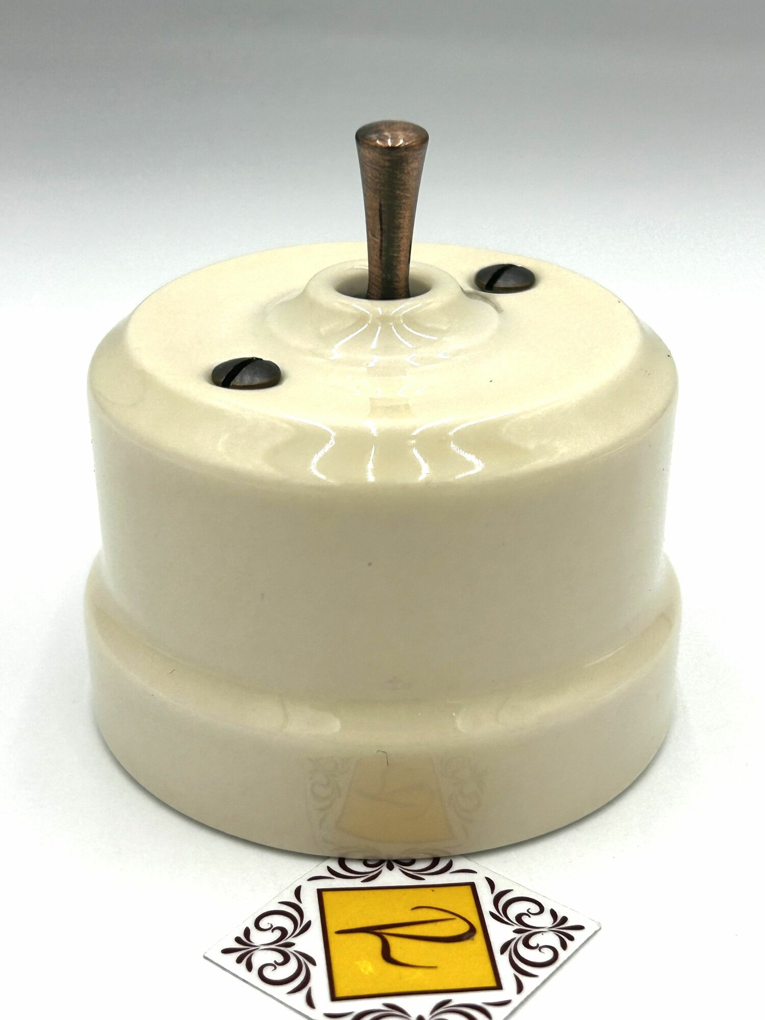 Тумблерный ретро выключатель , проходной Lindas Линдас, цвет слоновая кость, ручка Медь 34509-C