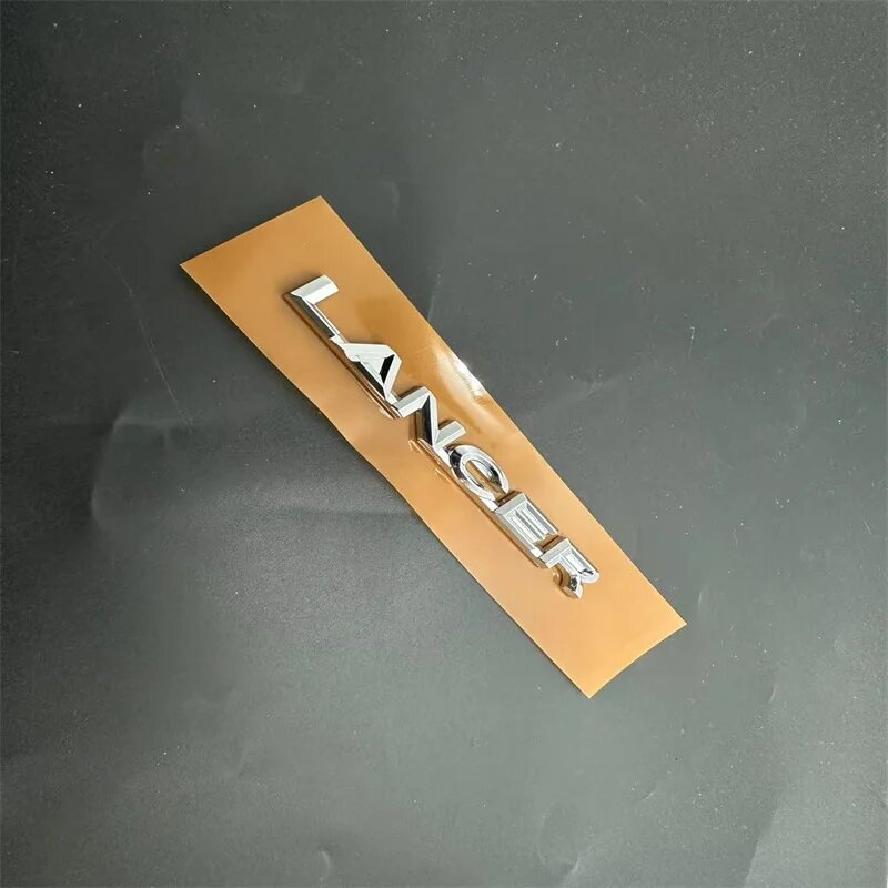 Логотип LANCER, хром, наклейка на багажник