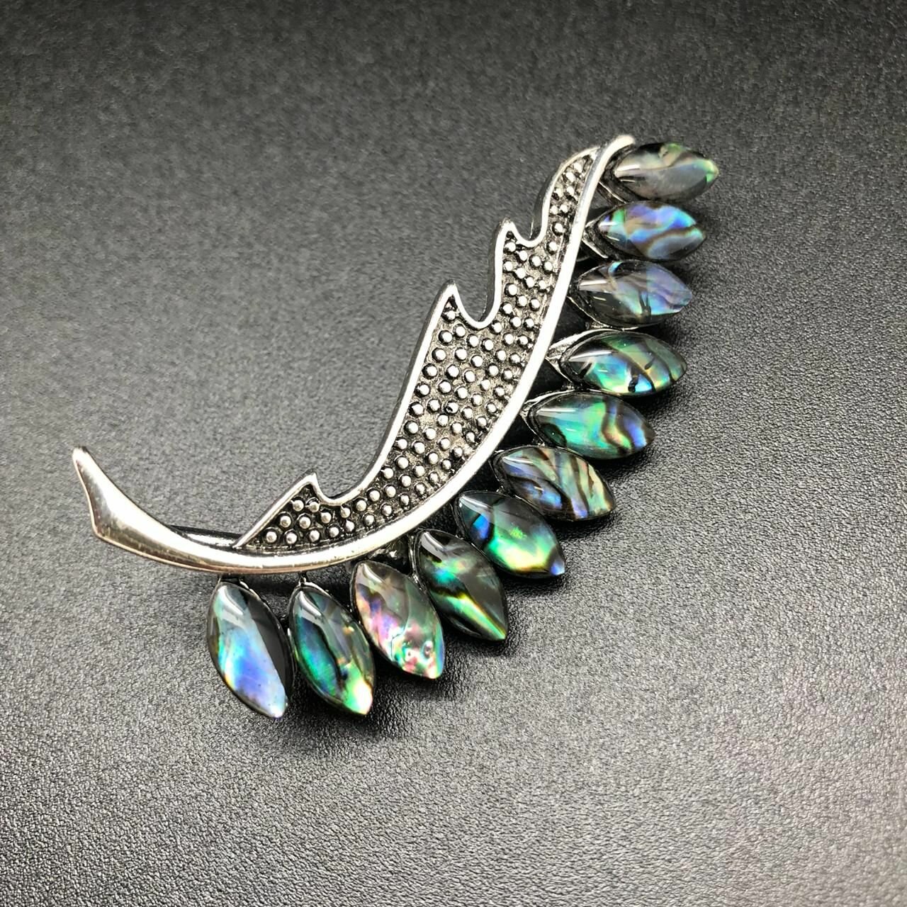 Брошь, гелиотис