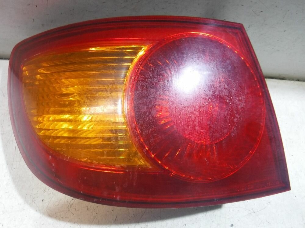 Фонарь задний левый Hyundai Elantra III 924012D210
