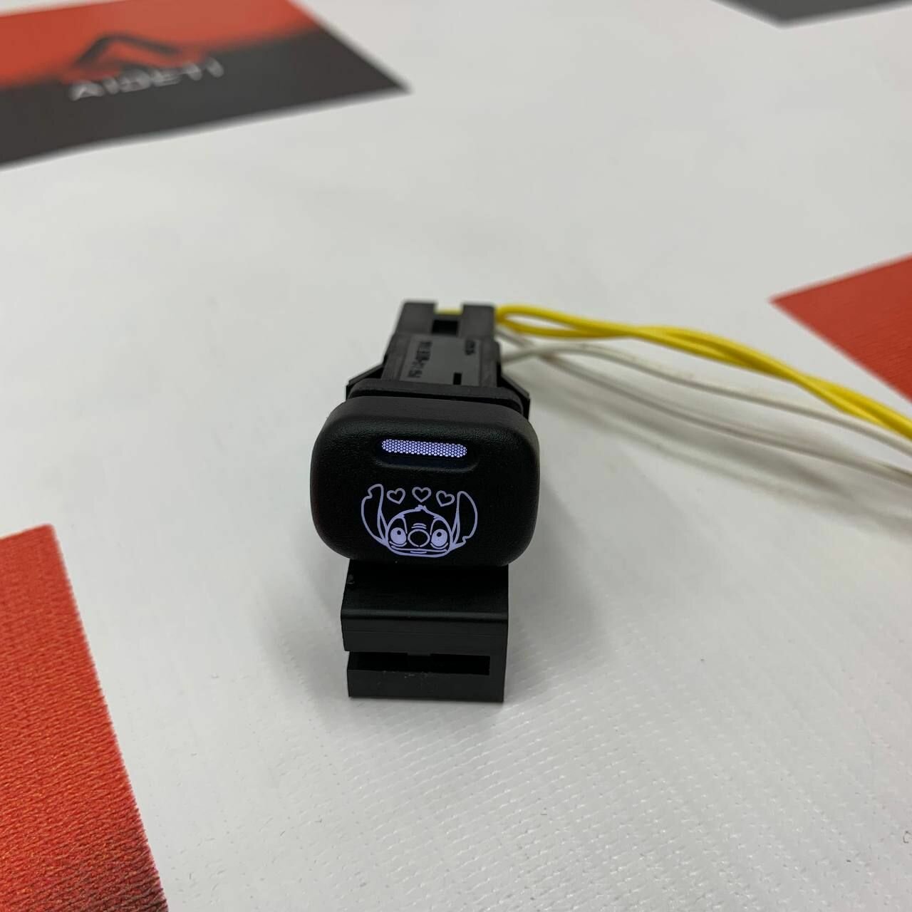 Кнопка с пересветом салона для 2113-2114,2110-2112, Нива шевроле Рисунок стич 1 шт