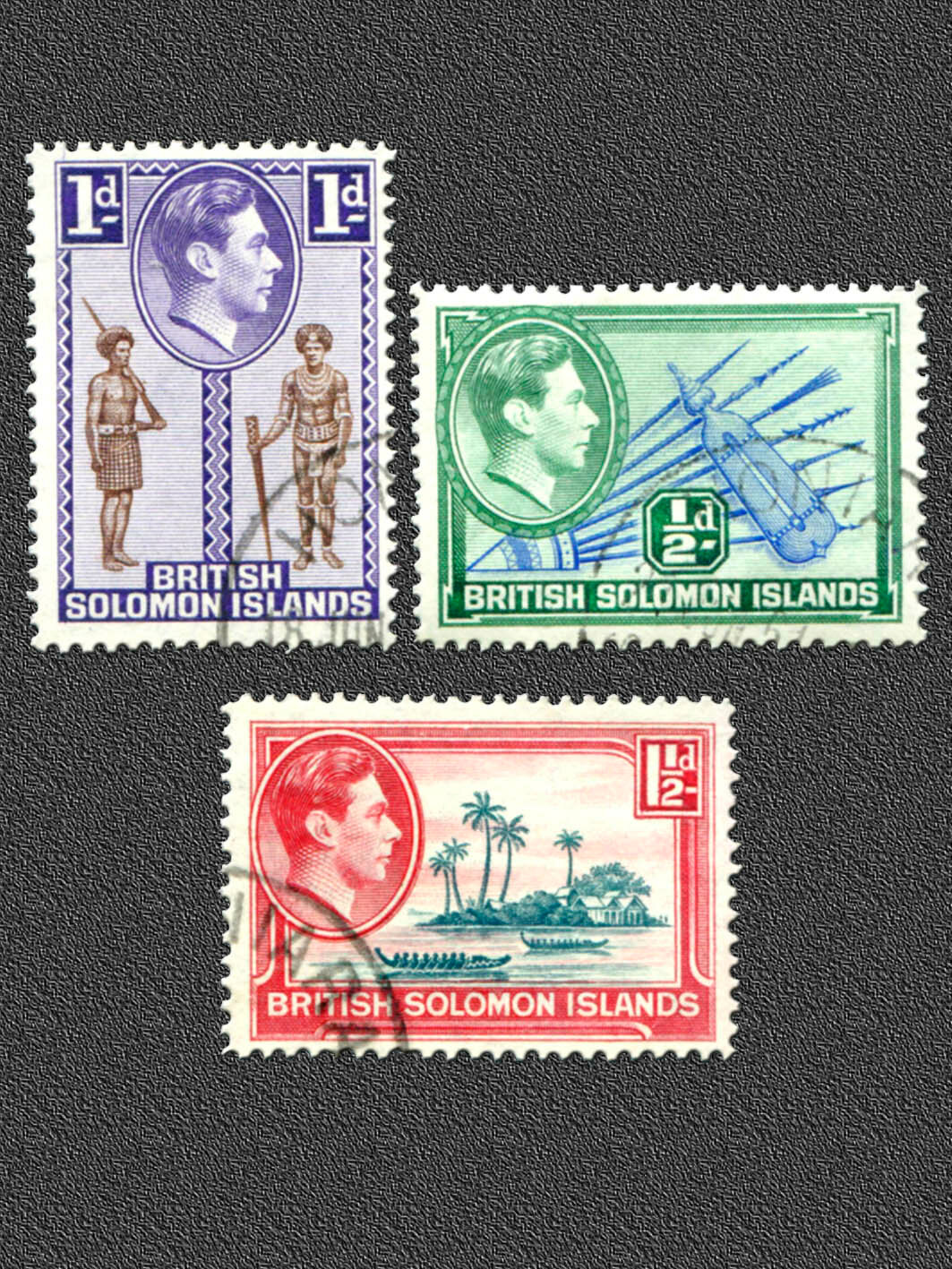 Соломоновы острова-1939. Король Георг VI. Культурные традиции, предметы быта, оружие и виды островов. Серия из 3 почтовых марок. Гашение