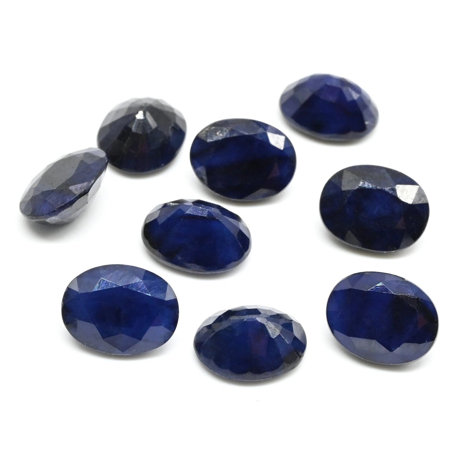 Кабошон из сапфира овал граненый 7*9мм, 3,4ct