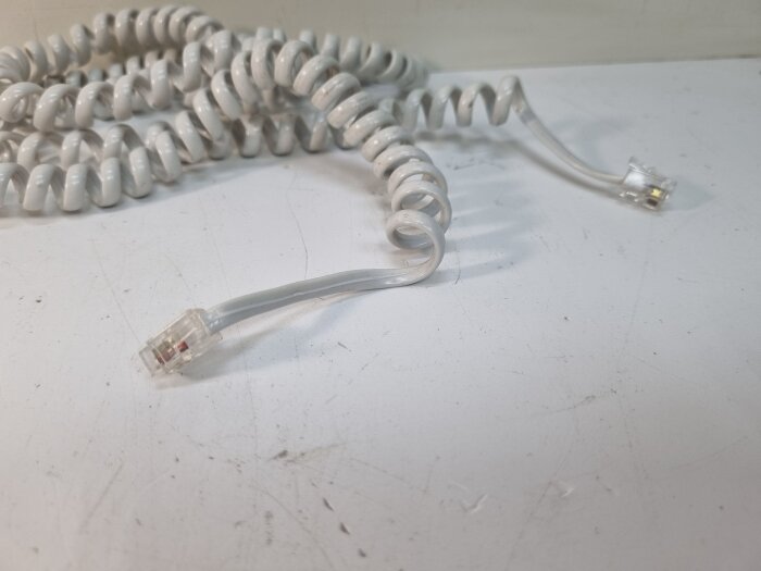 Кабель телефонный RJ11/6P4C витой 1.25 м белый