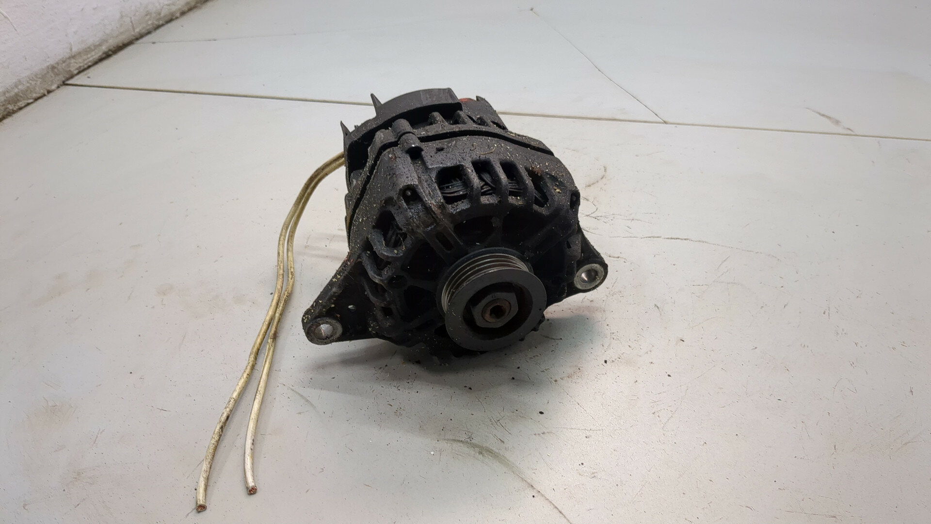Генератор Nissan Note E11 Б/У